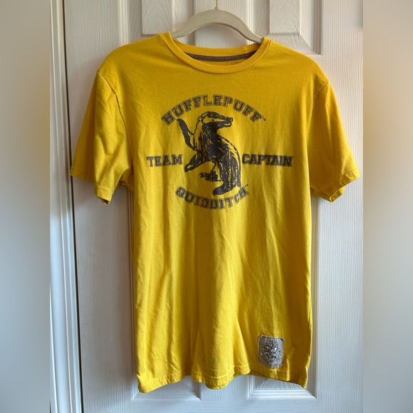 Tops | Yellow Hufflepuff Team Captain Tshirt Small | Poshmark